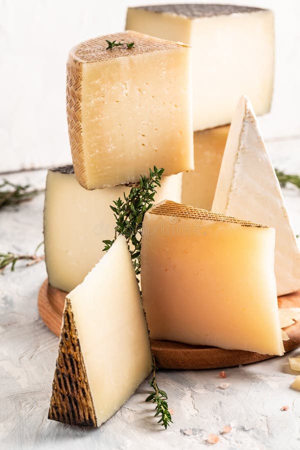 Cheese Board of Various Types of Soft and Hard Cheese. Spanish Manchego ...