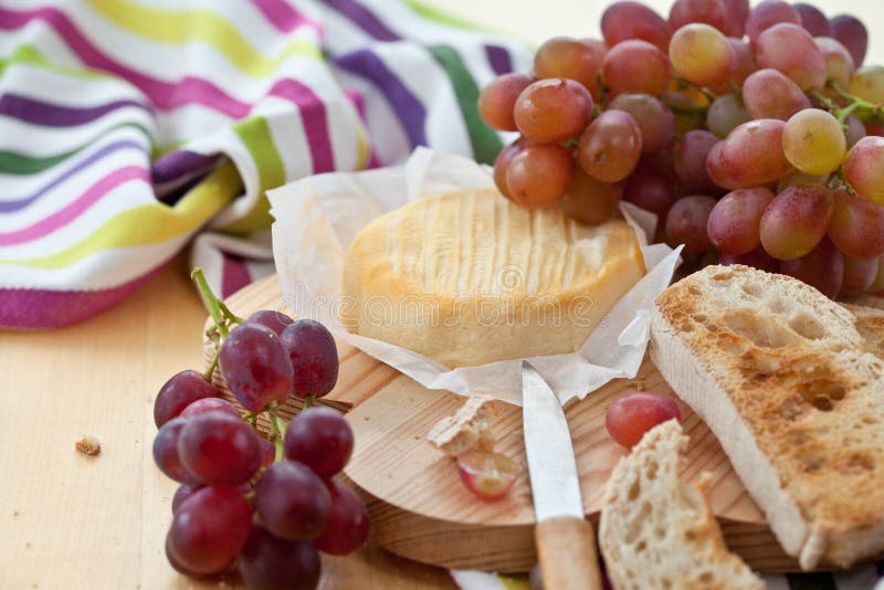 Cheese, bread and grapes stock photo. Image of horzontal - 35666228