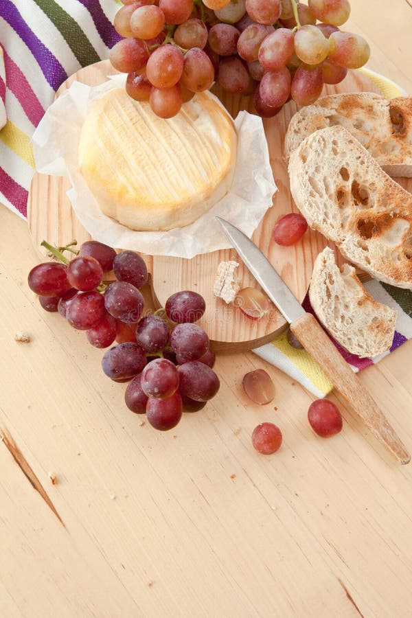 Cheese, bread and grapes stock photo. Image of bright - 35666294