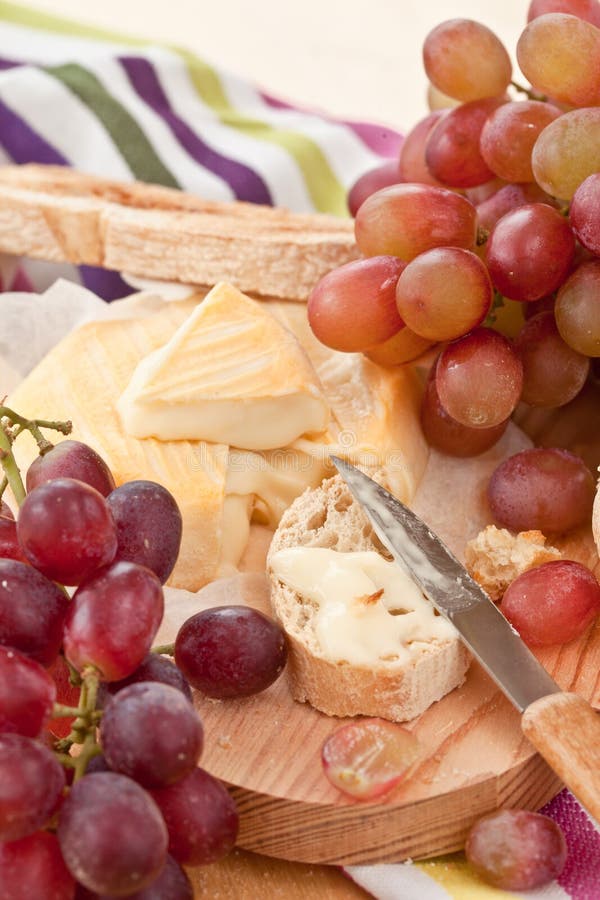 Cheese, bread and grapes stock image. Image of detail - 35666323