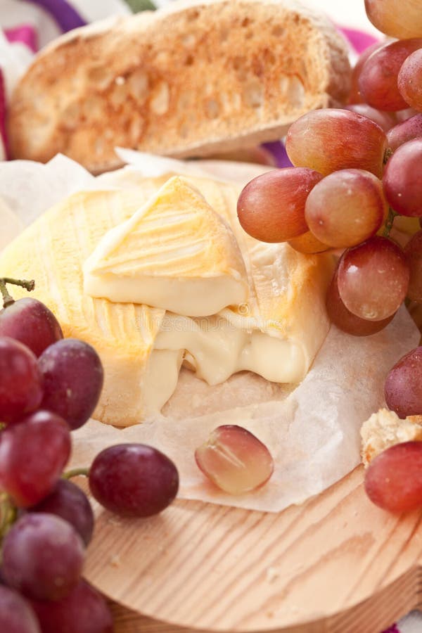 Cheese, bread and grapes stock image. Image of toast - 35666379