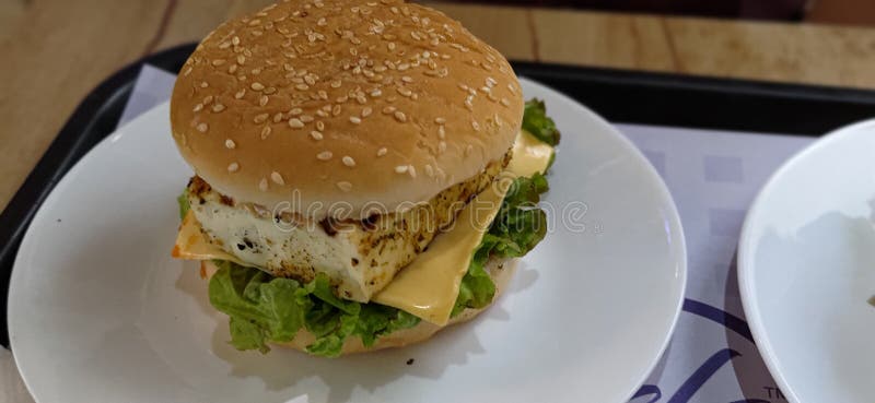 Cheese Burger with Big Paneer Slice Stock Photo - Image of hamburger ...