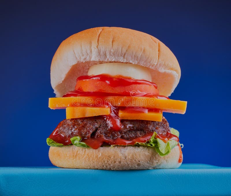 Cheese Burger on Blue Background. Stock Image - Image of food, cheese ...