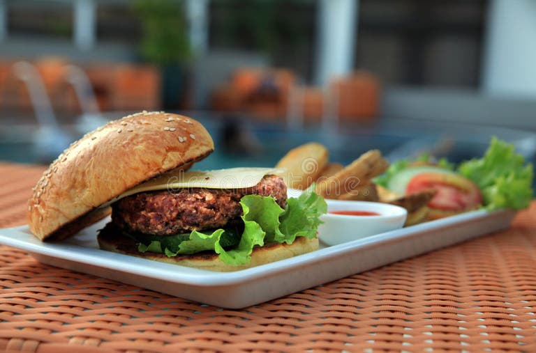 Cheese Burger at Swimming Pool Stock Image - Image of salad, gourmet ...