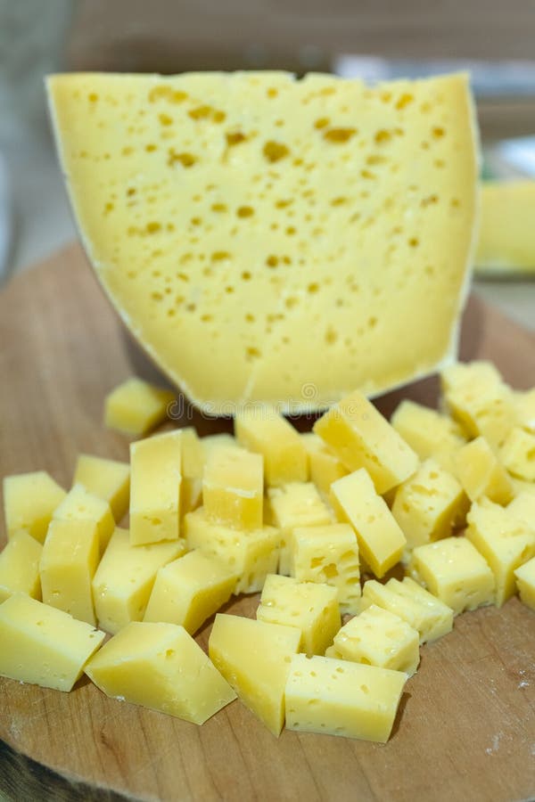 Cheese is Cut into Small Cubes Stock Photo - Image of single, organic ...