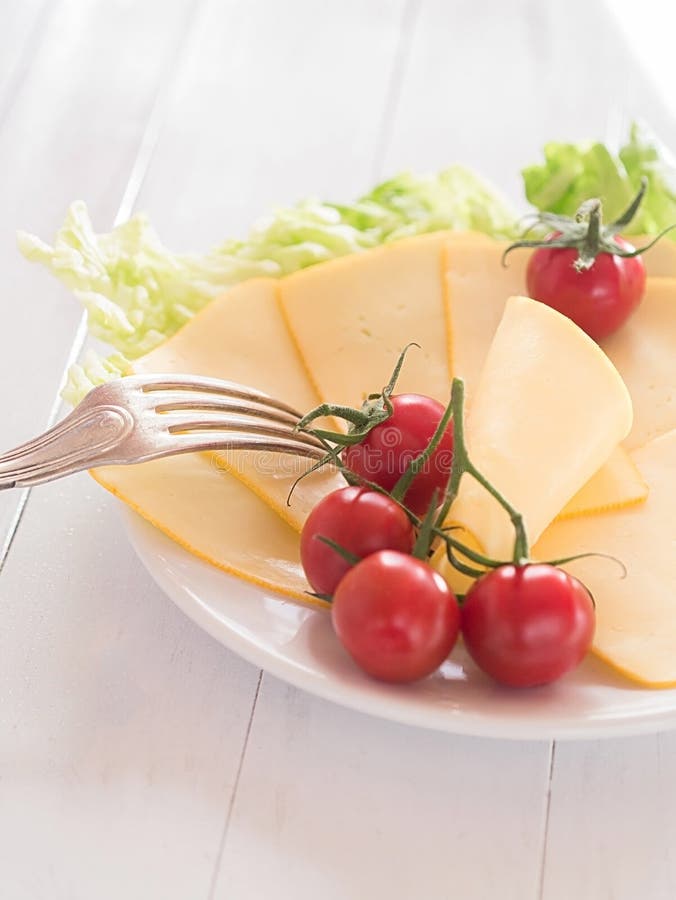 Cheese in Discs Cut on a Plate Stock Photo - Image of breakfast ...