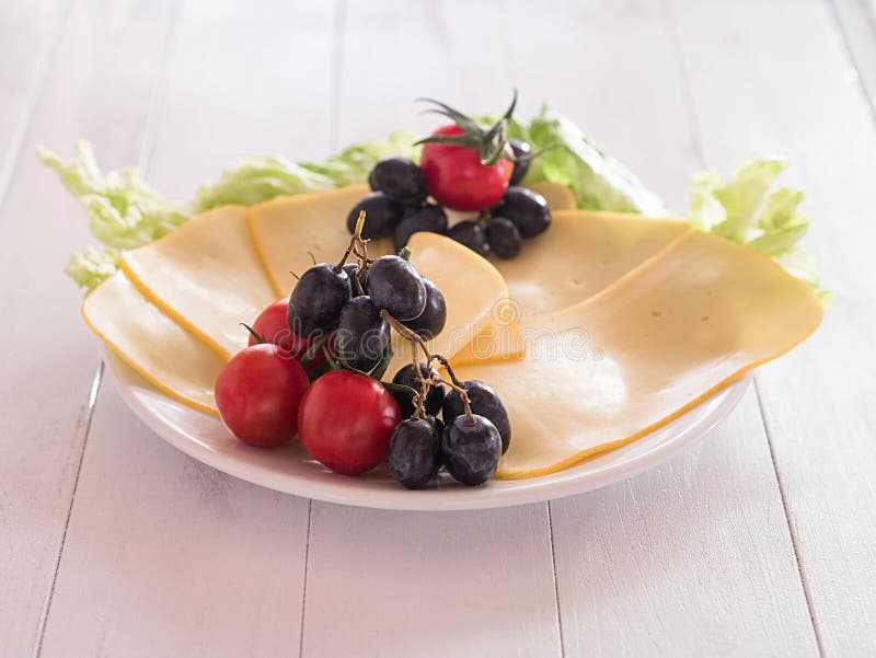 Cheese in Discs Cut on a Plate Stock Image - Image of plate, cheese ...