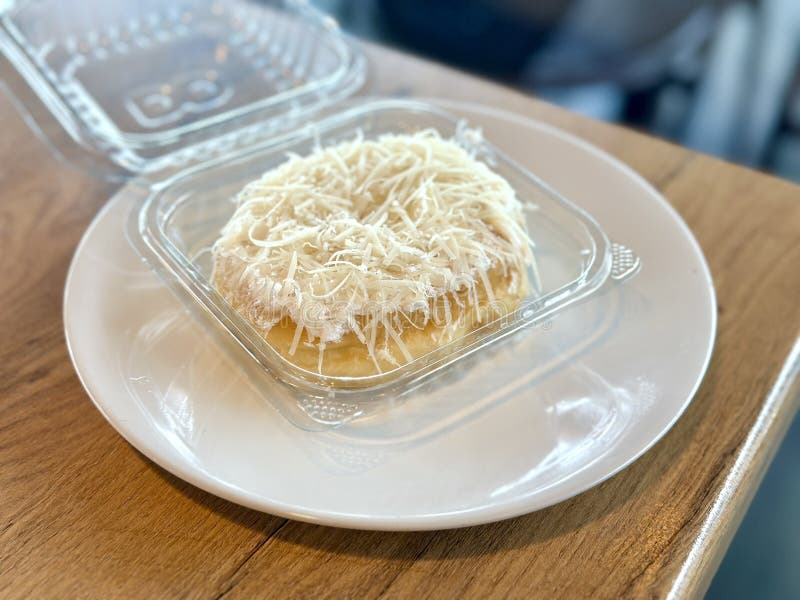 Cheese Donut in a Plastic Box on a Clear White Plate Stock Image ...