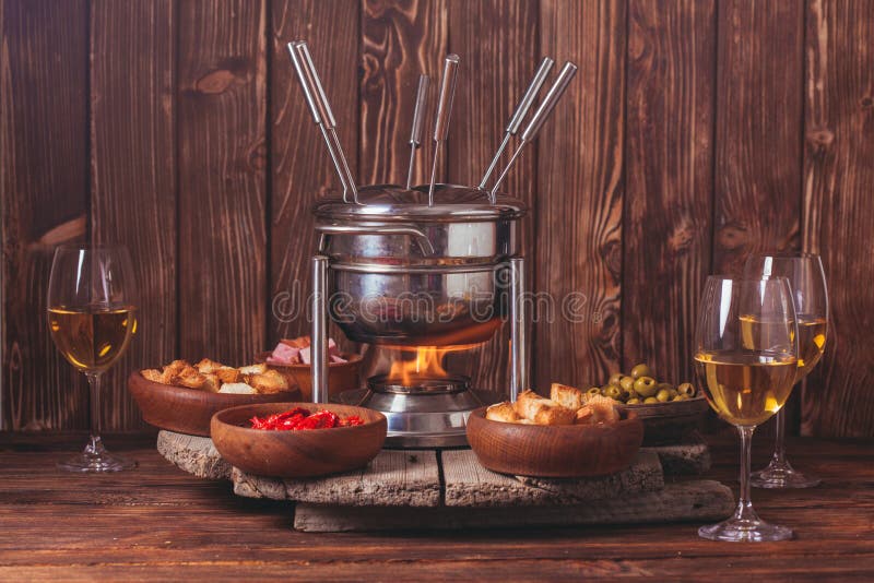 The cheese fondue stock image. Image of ingredient, fork - 76786447