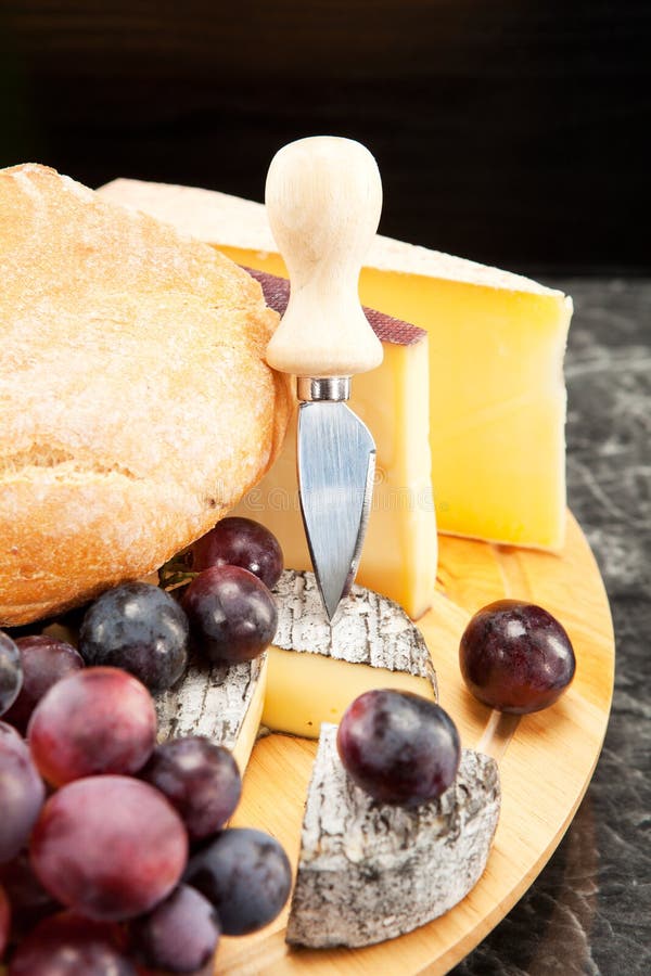 Cheese and grapes stock image. Image of gourmet, kitchen - 44801439