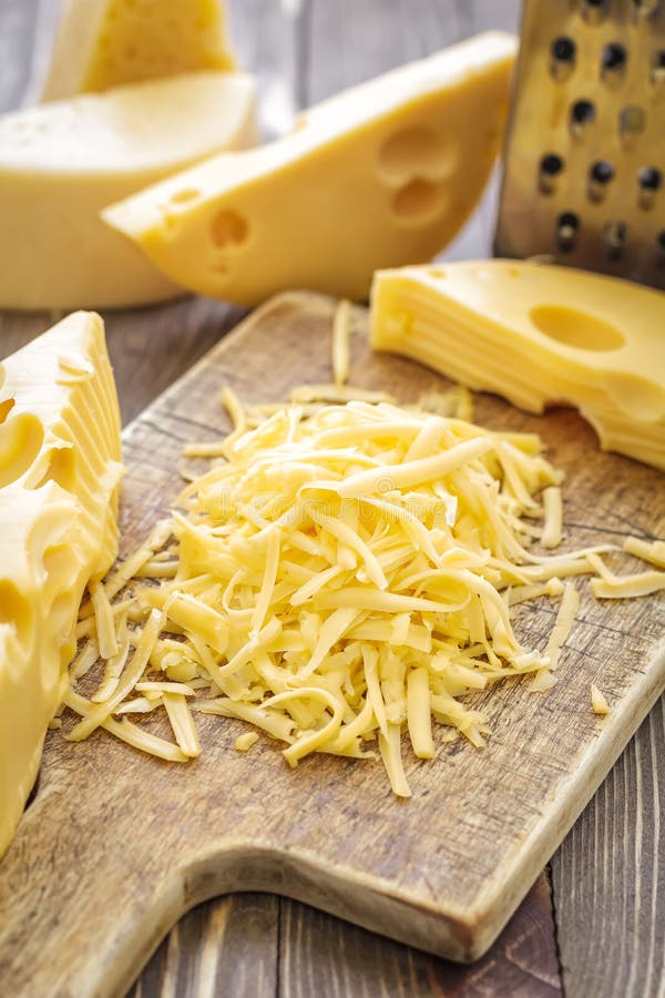 Grating cheese stock photo. Image of grate, hunk, board - 4271670