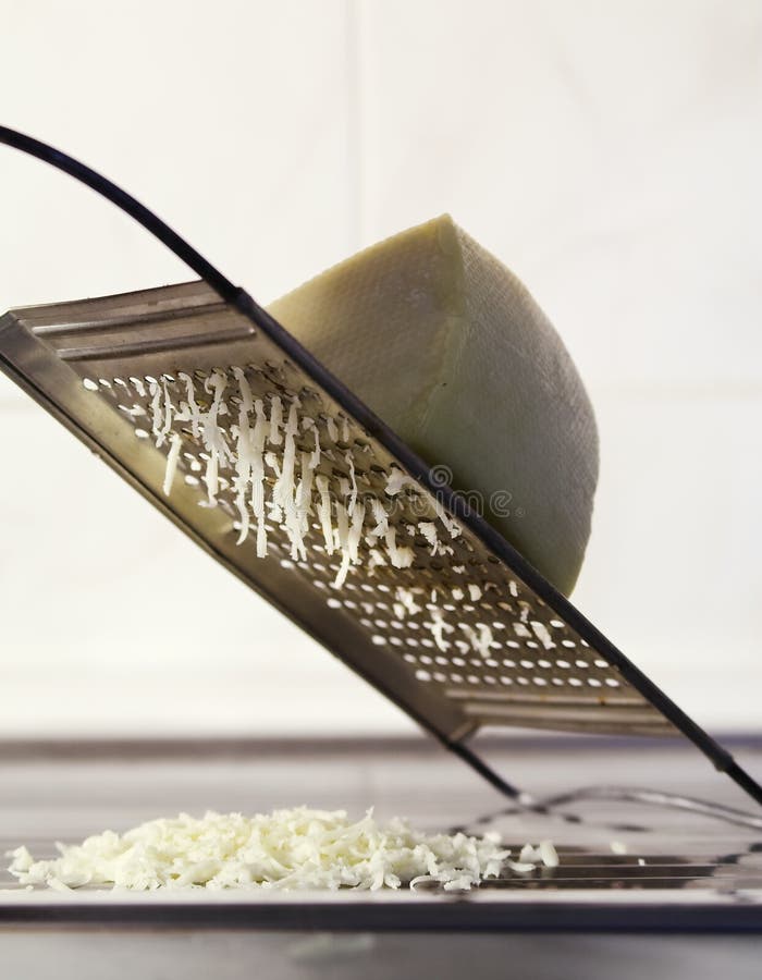 Wet Cheese Grater Close Up. Stock Image - Image of grating, cheese: 773227