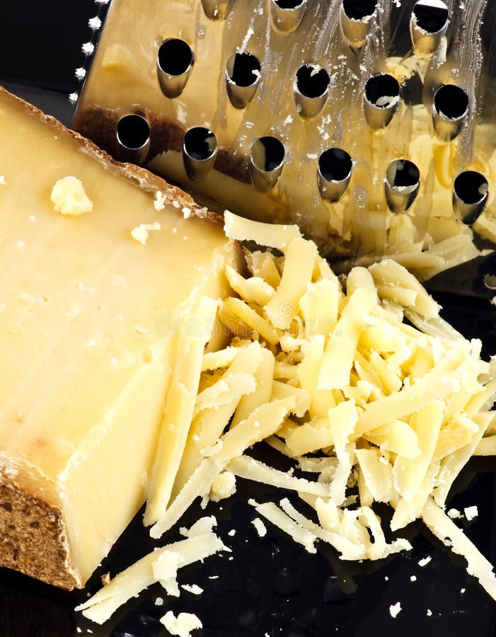 Grated cheese stock image. Image of cheese, block, cheddar - 16669141