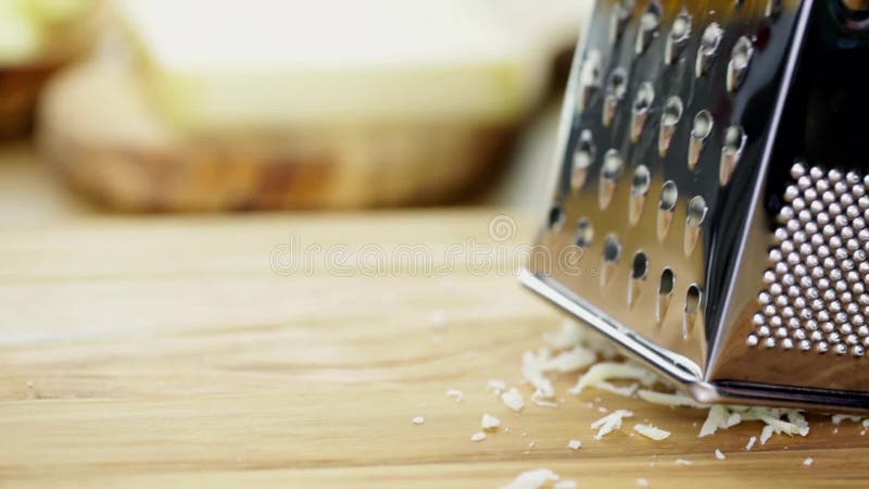 Cheese grater stock video. Video of preparing, cooking - 52994445