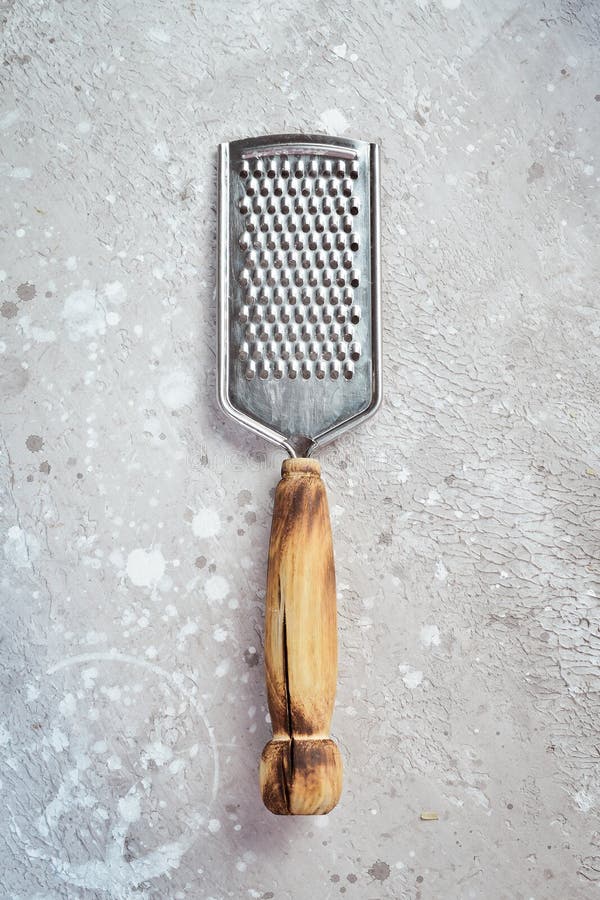Cheese Grater on a Stone Background. Kitchen Utensils Stock Image ...