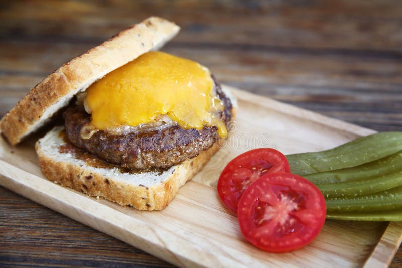 Cheese Hamburger in Toasted Stock Photo - Image of hamburger, fried ...