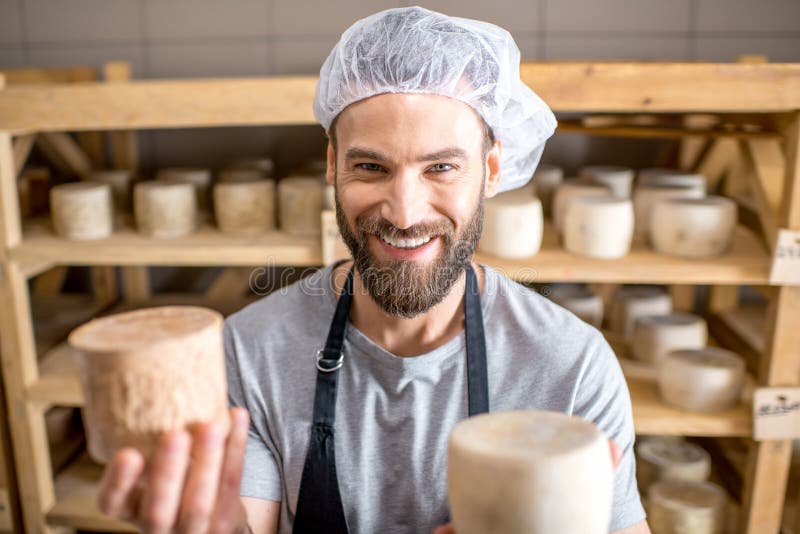 Cheese maker at the cellar stock photo. Image of small - 91241544