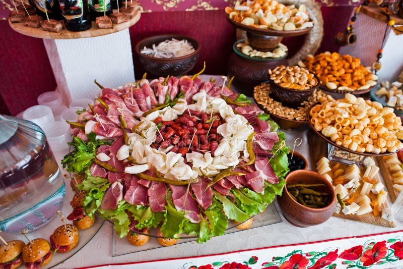 Cheese and Meat Decorated Dishes on the Wedding Banquet. Editorial ...