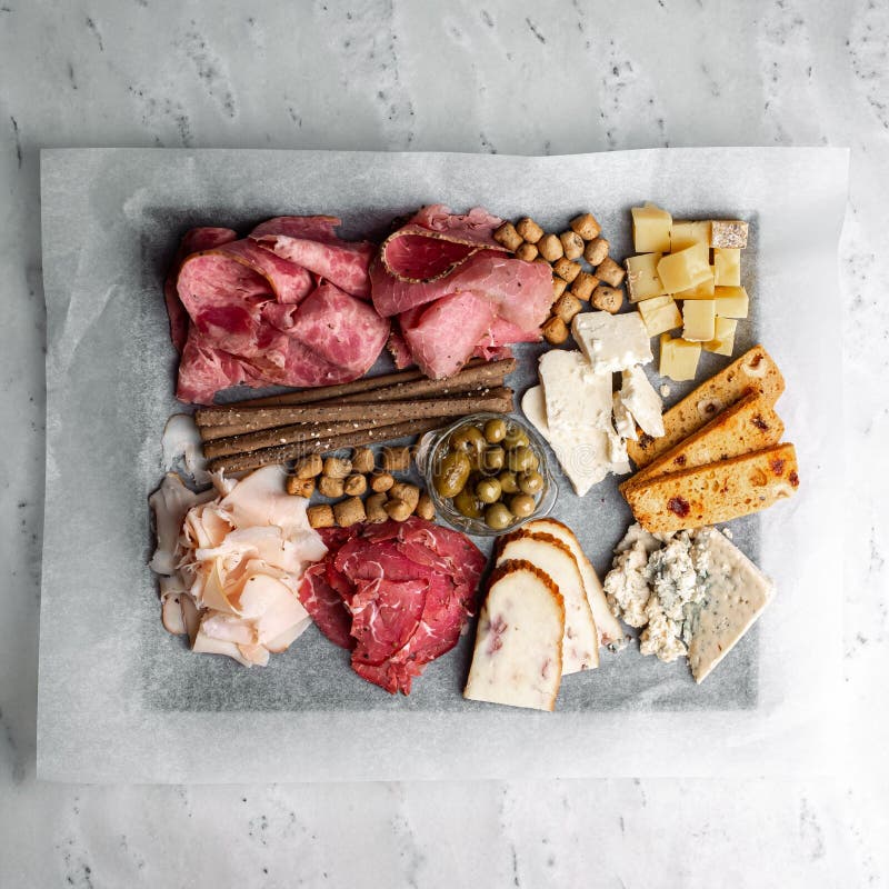 Cheese and Meat Platter on a Grey Marble Table Top Stock Photo - Image ...