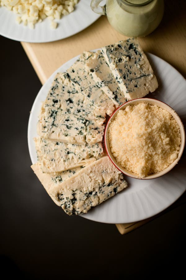 Cheese with Mold and Chopped Parmesan. Different Types of Cheese on ...