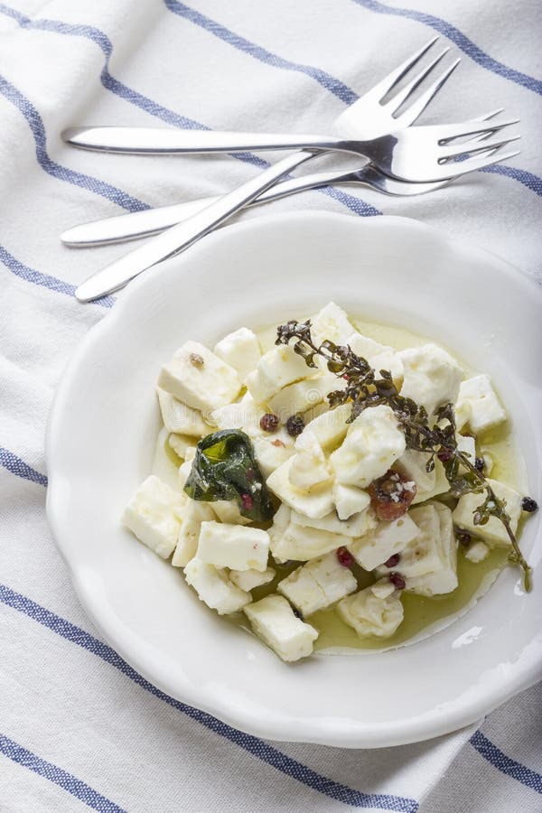 Cheese in oil stock image. Image of meal, olive, cooking - 44369599