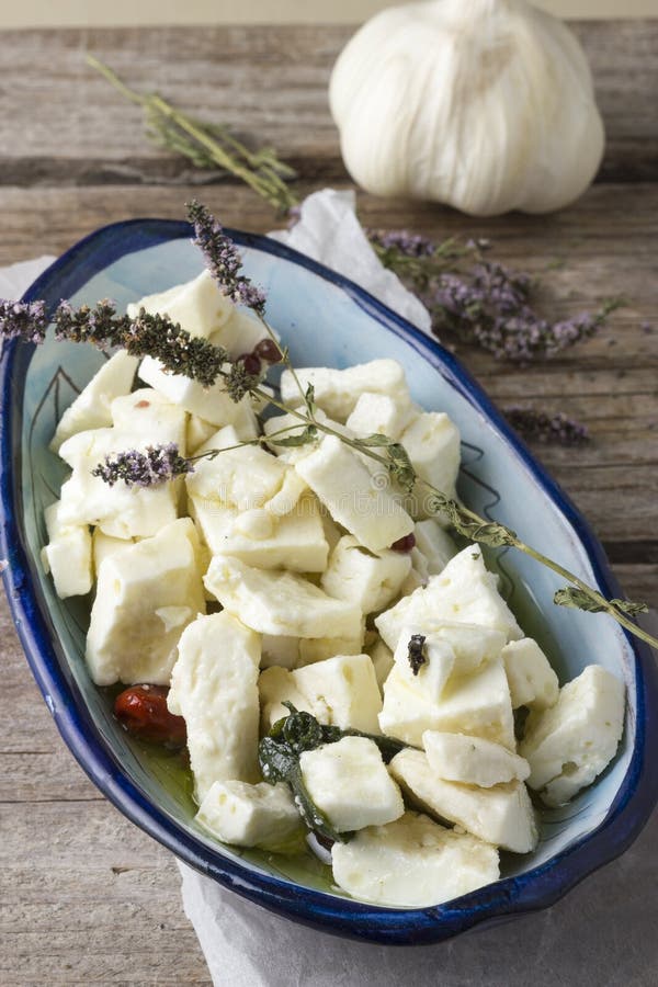 Cheese in oil stock photo. Image of spices, cubes, food - 44369740