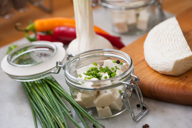 Cheese in oil stock image. Image of cuisine, brine, garlic - 31883153