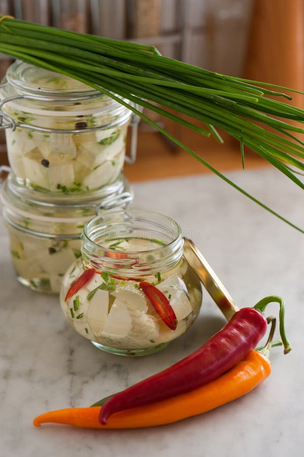 Cheese in oil stock image. Image of manufacture, herbs - 31883195