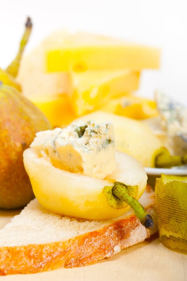 Cheese and pears stock image. Image of gourmet, board - 240882773
