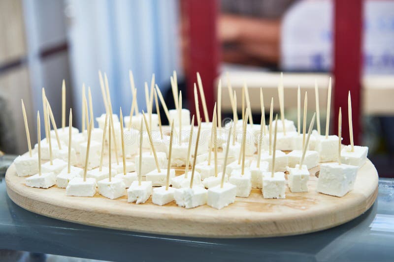 Cheese pieces for sampling stock image. Image of party - 362671809