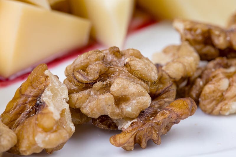 Cheese pieces with walnuts stock photo. Image of organic - 102134314