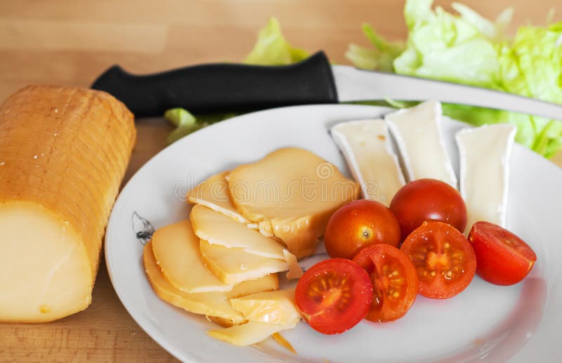 Cheese plate stock image. Image of rich, knife, cutlery - 23595557
