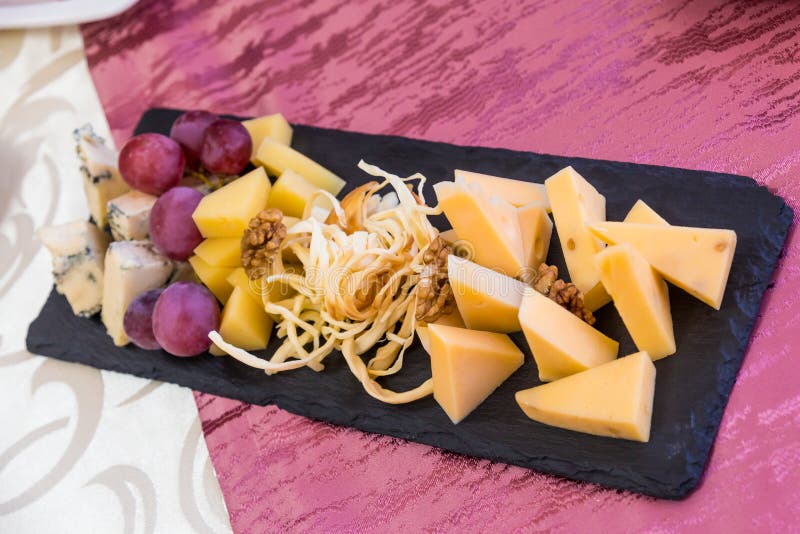 Cheese Plate at the Banquet in the Restaurant. Delicacies and Snacks at ...