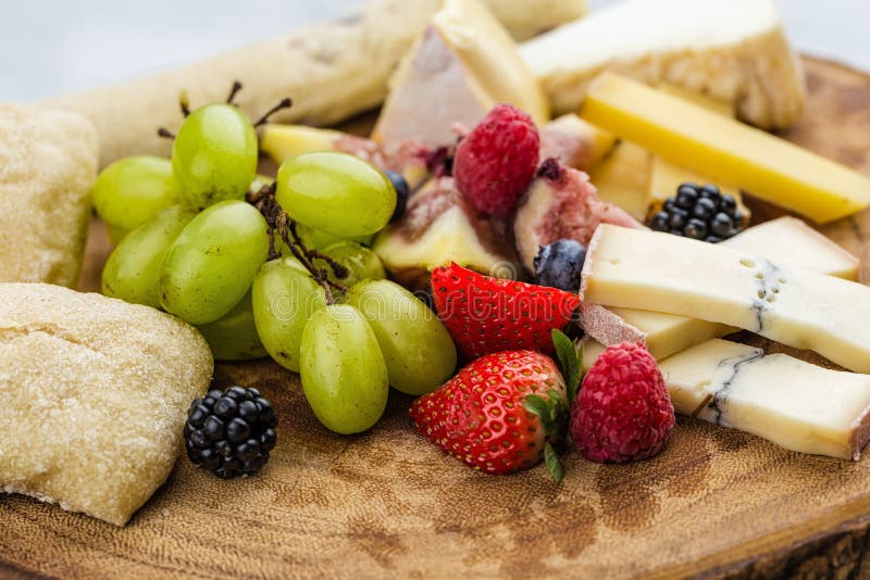 Cheese Plate with Bread Grapes and Strawberries Stock Image - Image of ...