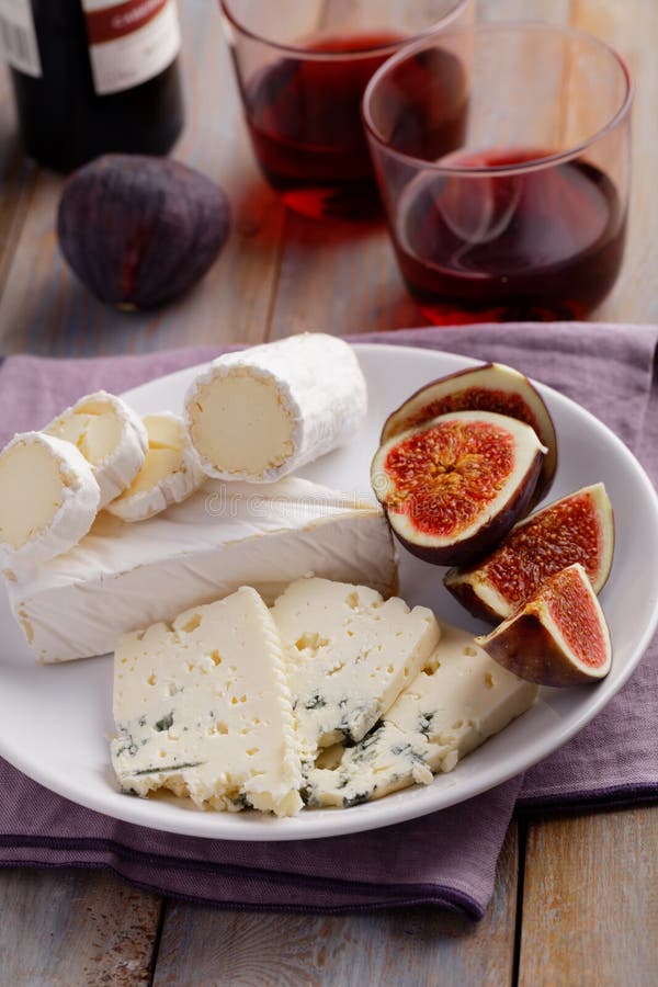Cheese and figs stock photo. Image of leaf, figs, swiss - 18205272