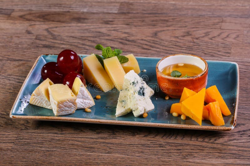 Cheese plate mix stock image. Image of italian, dessert - 129515433
