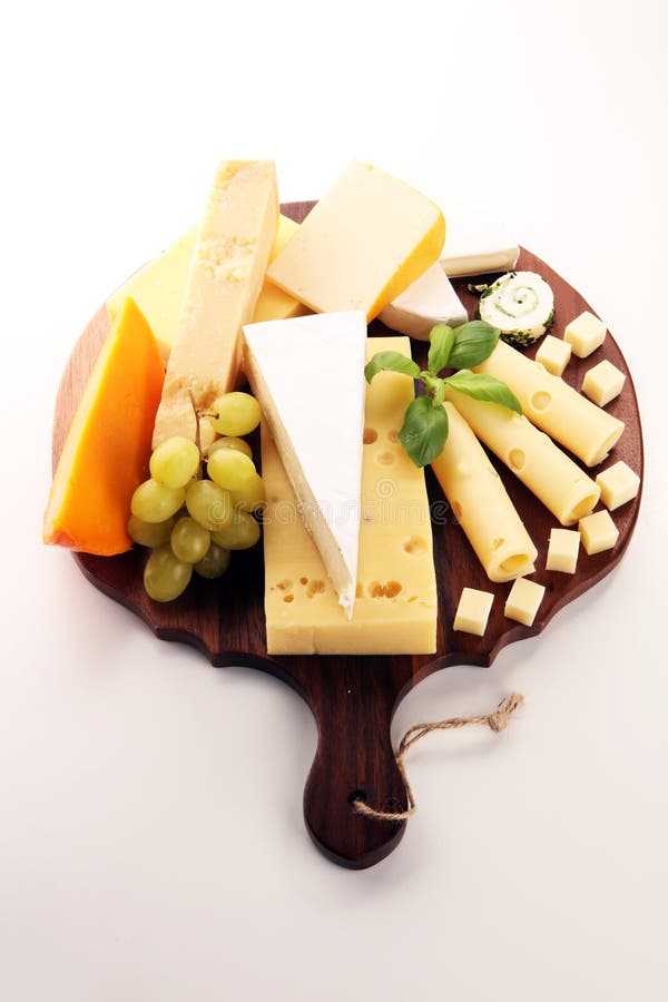 Cheese Plate Served with Grapes, Various Cheese on a Platter Stock ...