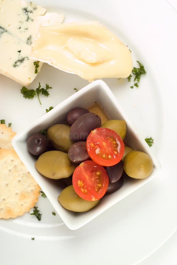 Cheese platter stock image. Image of cheese, tomatoe, olives - 7644725