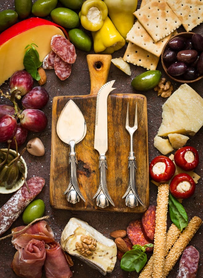 Cheese platter. Antipasti. stock image. Image of olive - 86665411