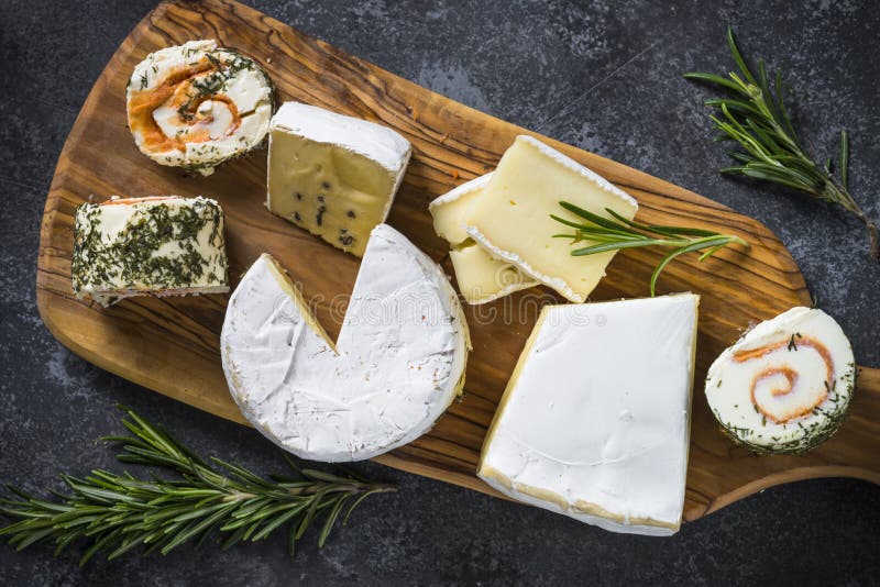 Cheese Platter on Dark Stone Table. Stock Image - Image of brie ...
