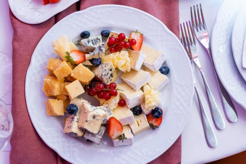 Cheese Platter with Different Cheese and Grapes. Stock Image - Image of ...