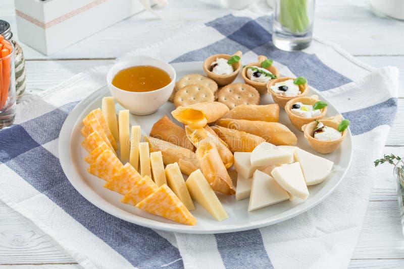Cheese Platter with Different Cheese and Honey Festive Gourmet ...