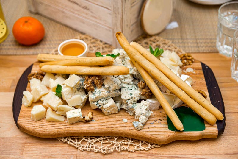 Cheese Platter with Gorgonzola, Blue Cheese, Walnuts and Honey Stock ...