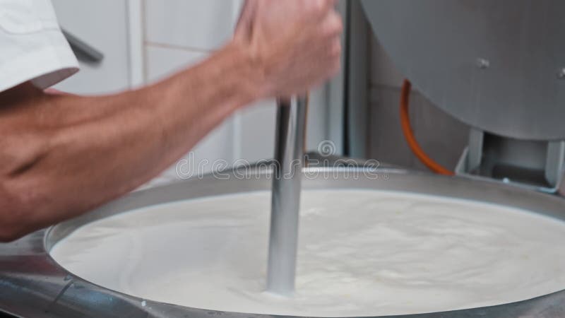 Cheese Production - Man Worker Working with a Vat with the Basis for ...
