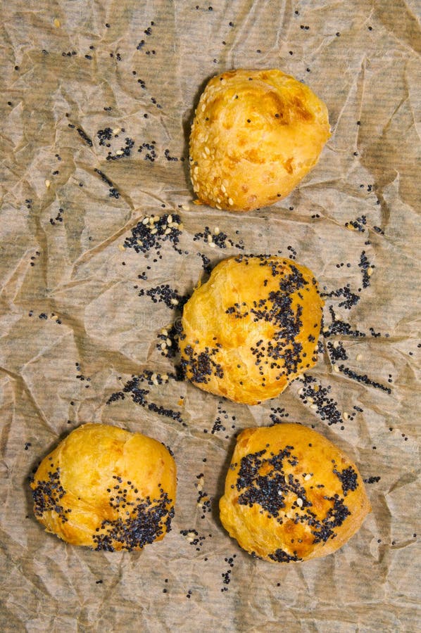 Cheese Profiteroles Sprinkled with Poppy Seeds Stock Photo - Image of ...