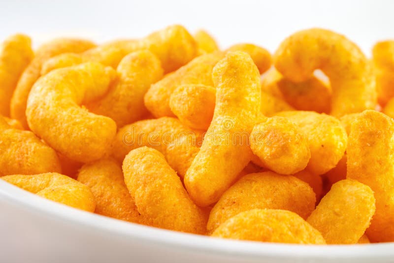 A stack of cheese puffs stock image. Image of carry - 111613571
