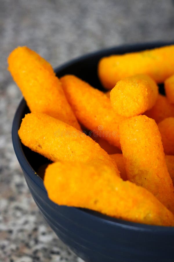 Cheese Puffs Close Up View from the Side Stock Photo - Image of color ...