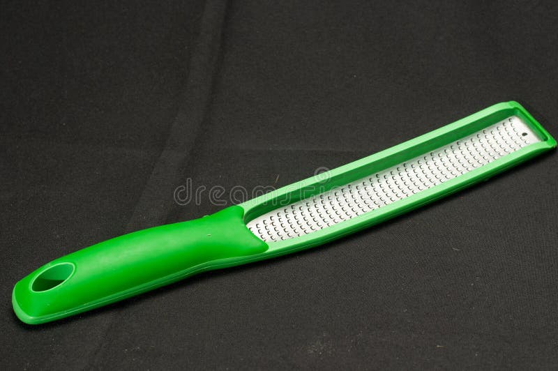 Cheese shredder stock photo. Image of texture, black - 268427916