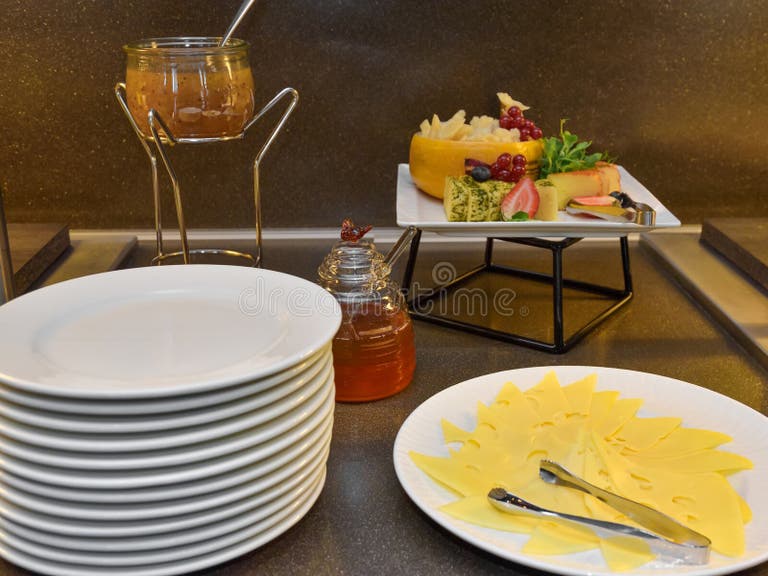 Cheese Sliced on a Plate for Self Service Breakfast Buffet Stock Photo ...