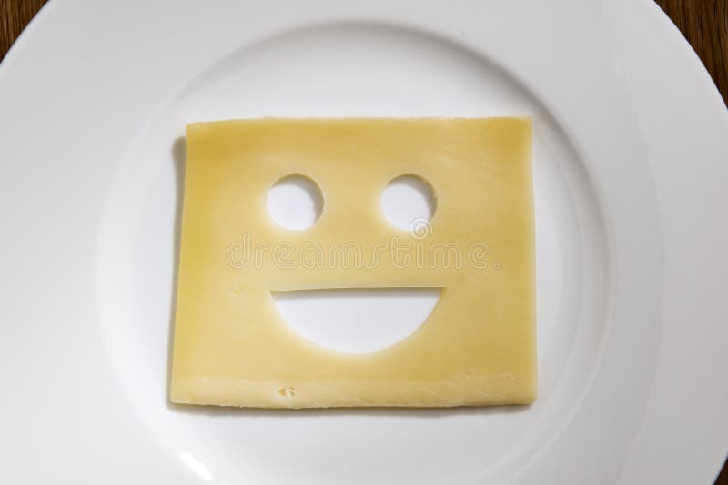 Cheese with Smiling Face on a Table Stock Image - Image of selective ...
